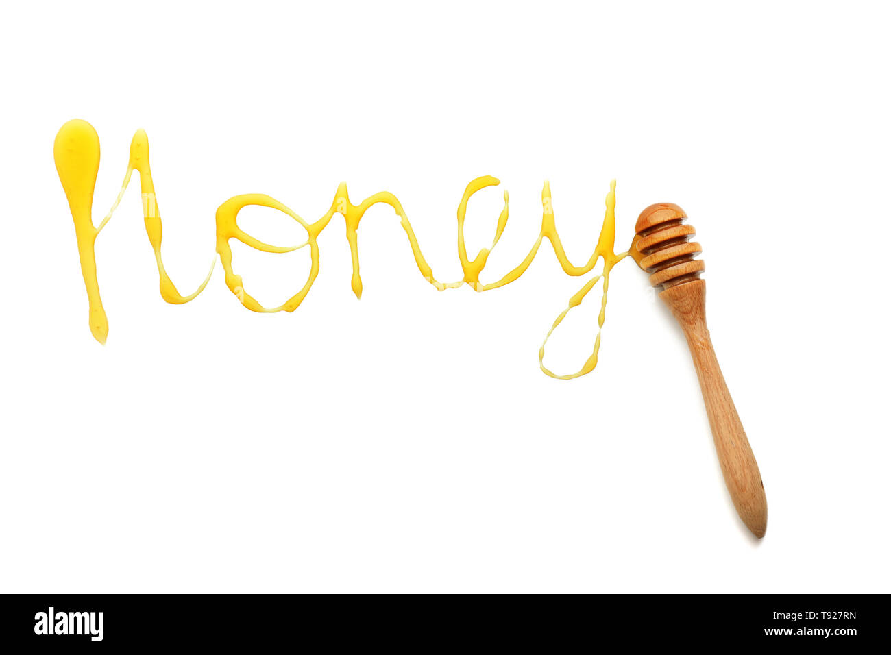 Word HONEY and wooden dipper on white background Stock Photo - Alamy