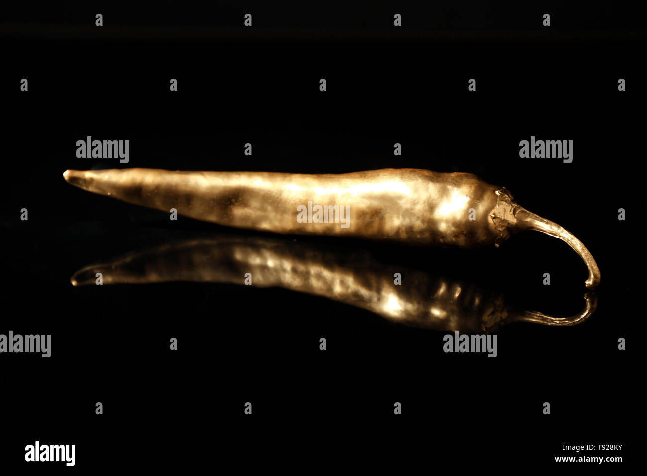 Gold chili pepper hi-res stock photography and images - Alamy