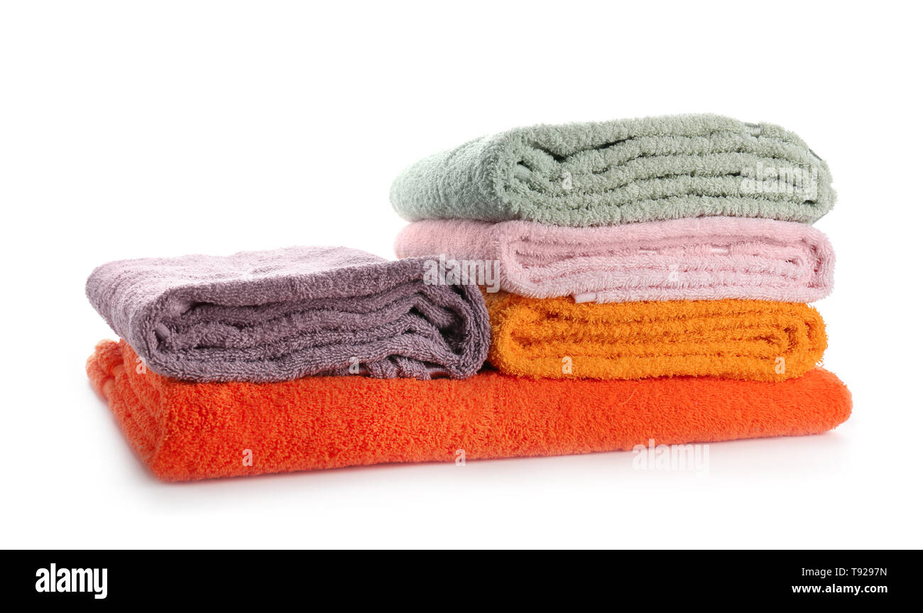 Stack of clean soft towels on white background Stock Photo - Alamy