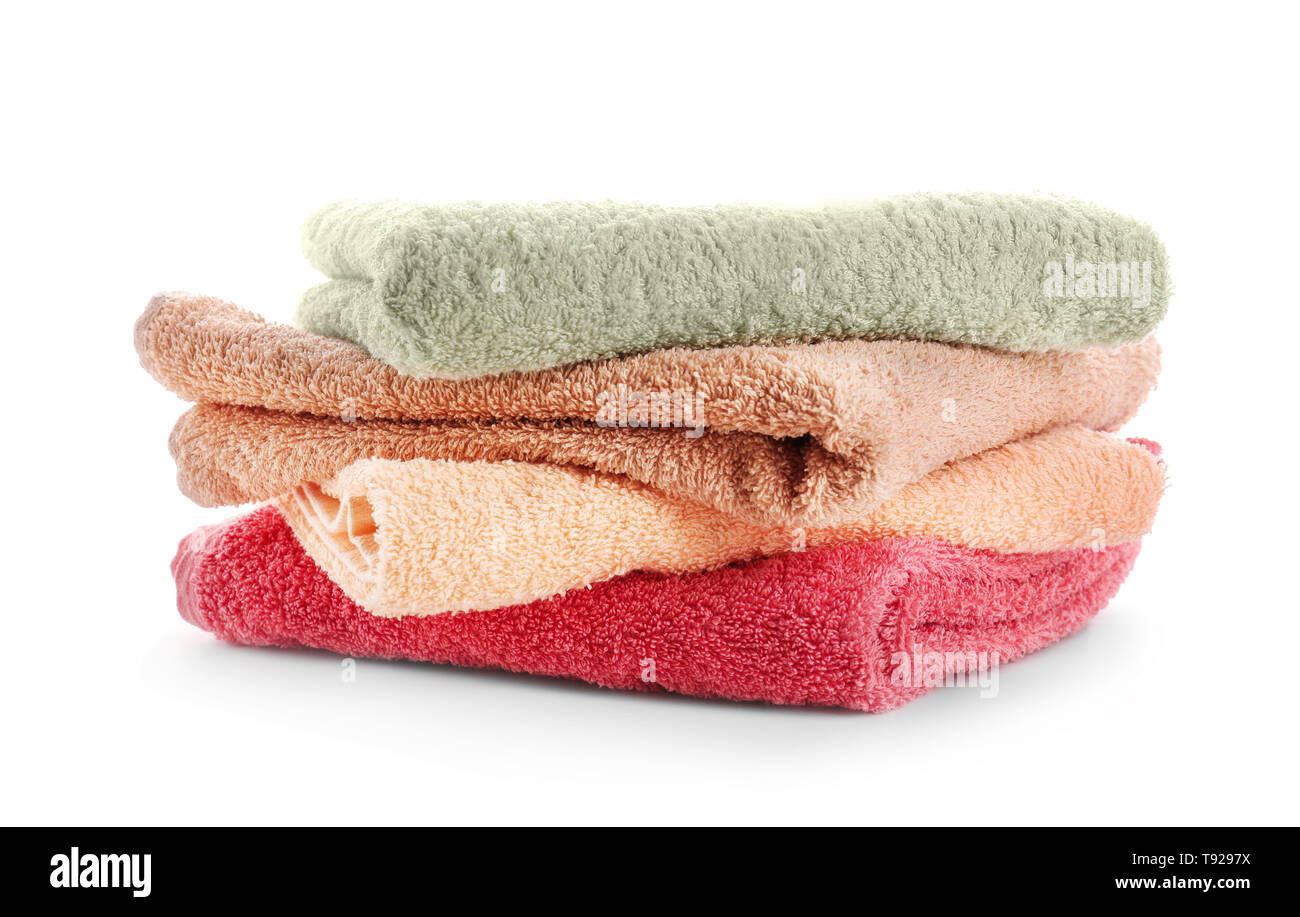 Stack of clean soft towels on white background Stock Photo - Alamy