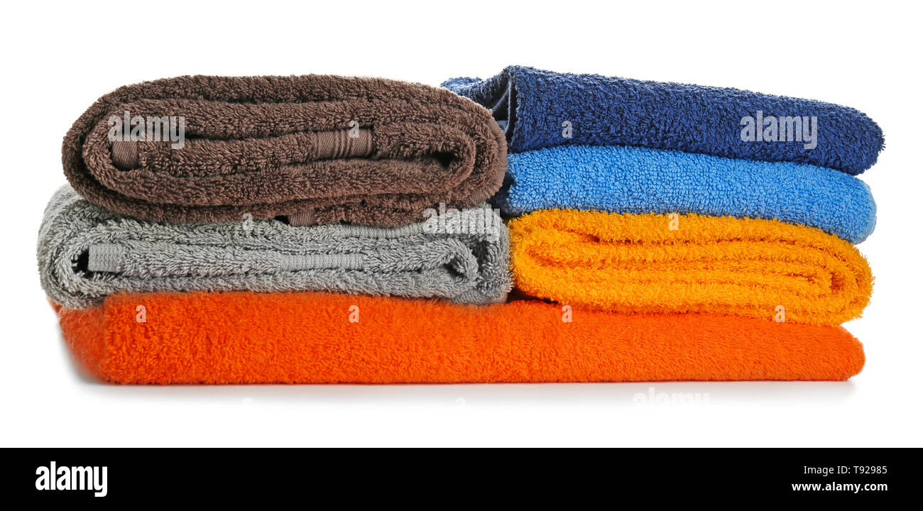 Stack of clean soft towels on white background Stock Photo - Alamy