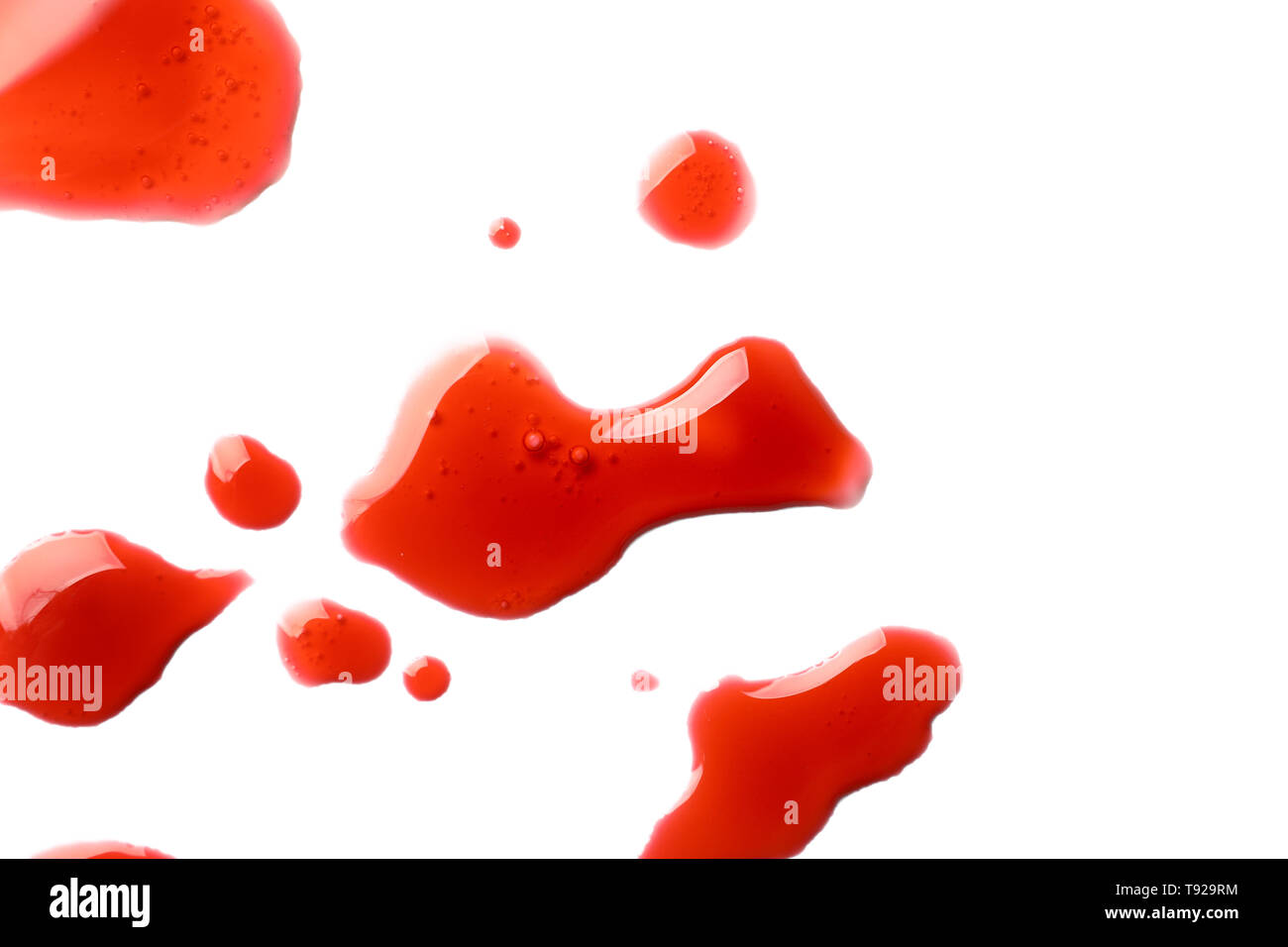 Blood splashes on white background Stock Photo - Alamy