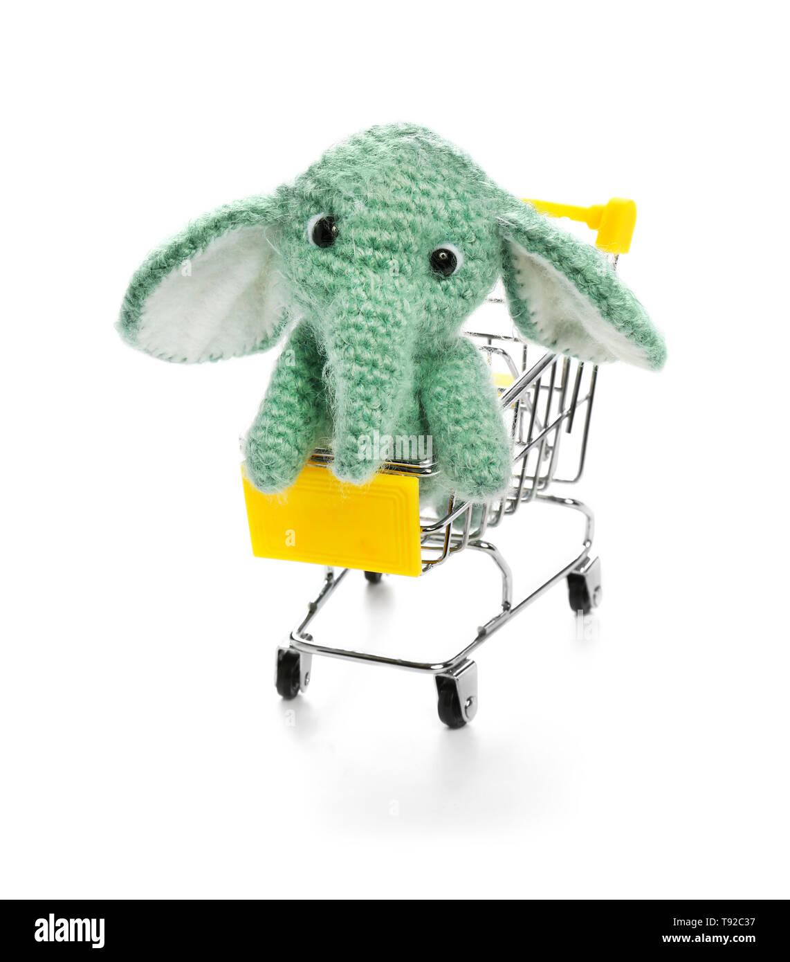 Toy for children in cart on white background. Shopping concept Stock ...