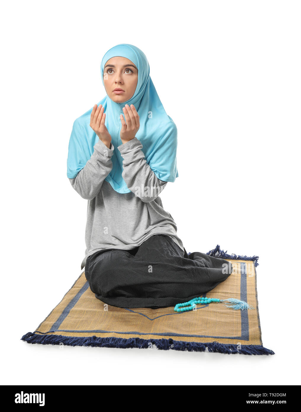 Young arabic woman sitting Cut Out Stock Images & Pictures - Alamy