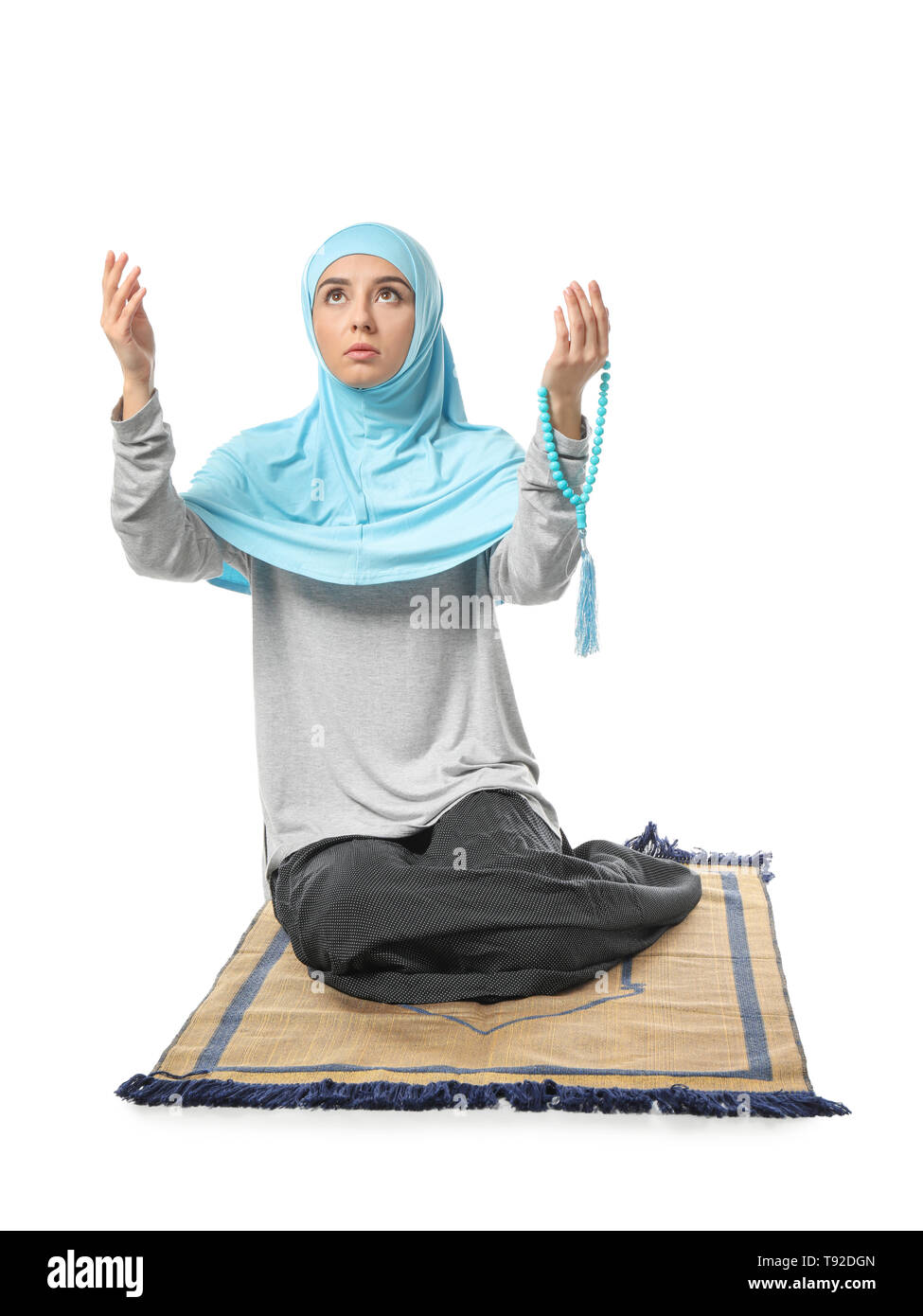 Young arabic woman sitting Cut Out Stock Images & Pictures - Alamy