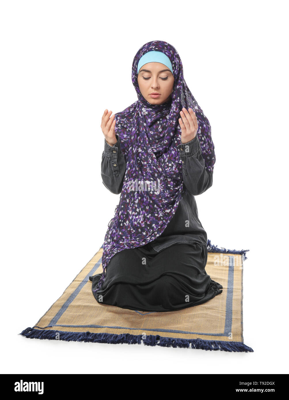 Muslim woman pray Cut Out Stock Images & Pictures - Alamy