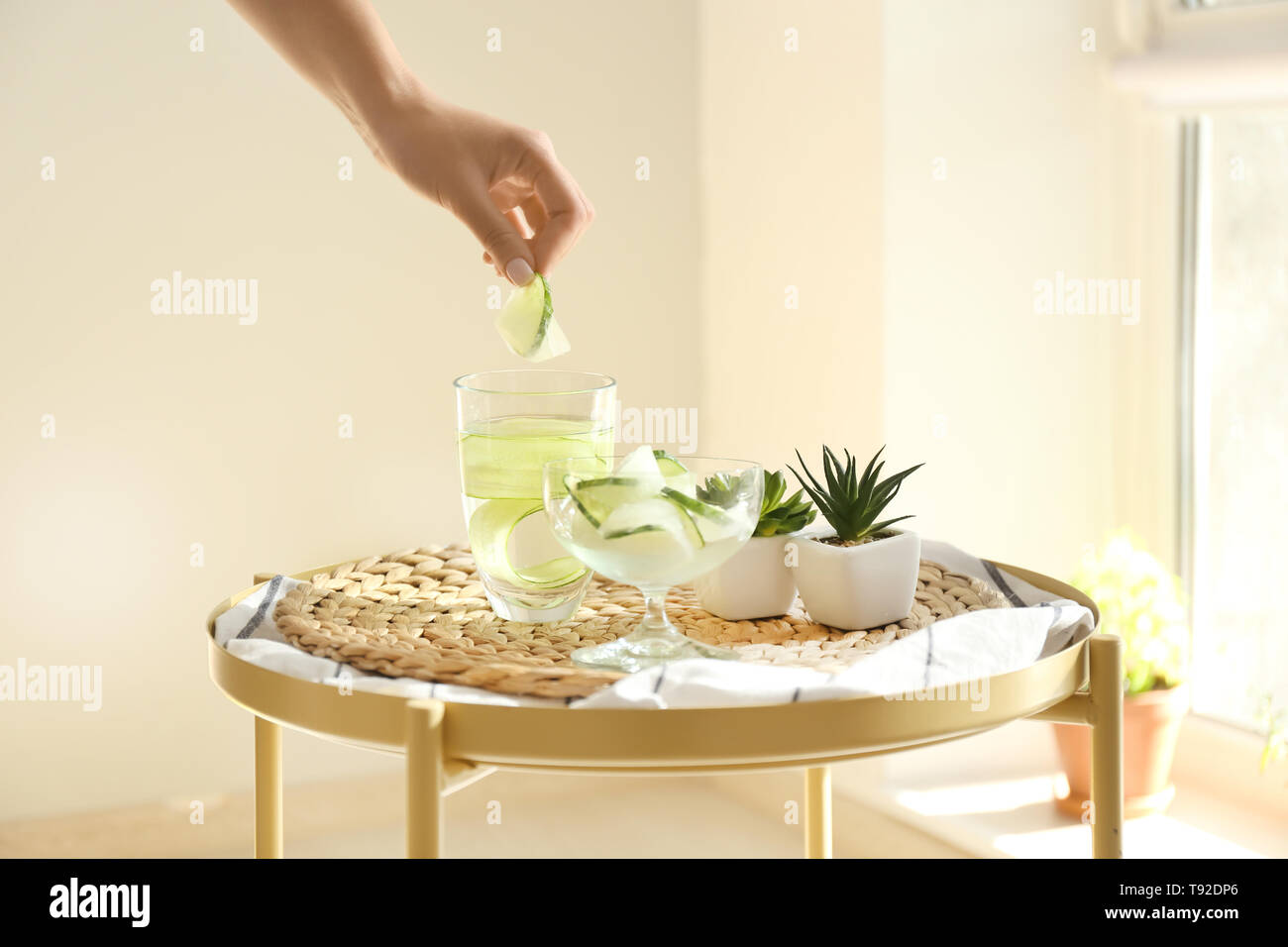 Woman putting cube green hi-res stock photography and images - Alamy