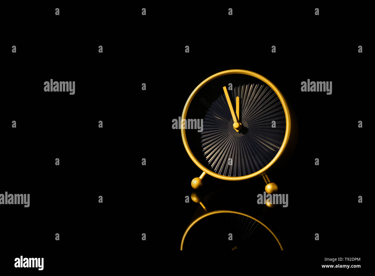 Golden alarm clock hi-res stock photography and images - Alamy