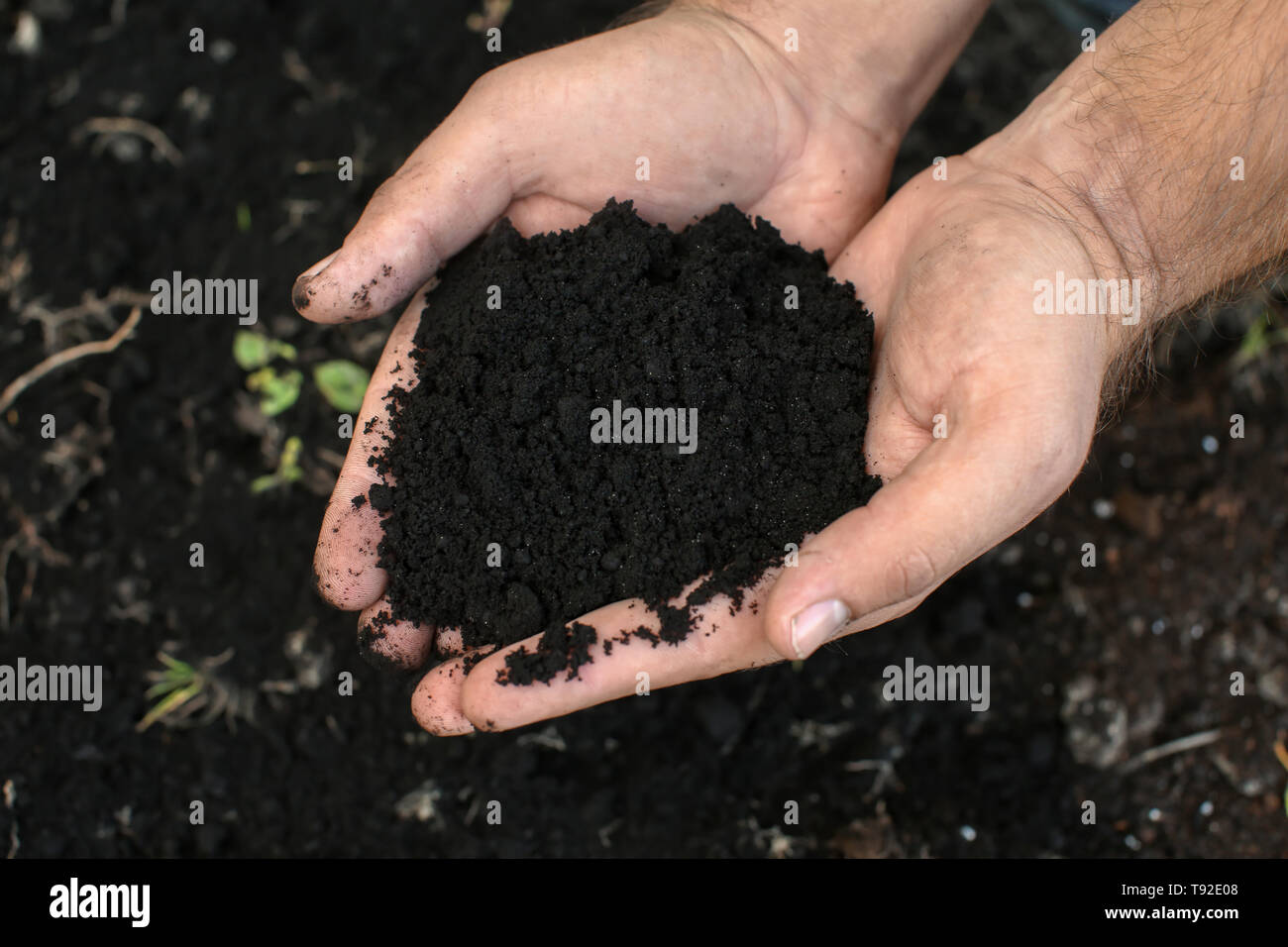 Black farmer compost hi-res stock photography and images - Alamy