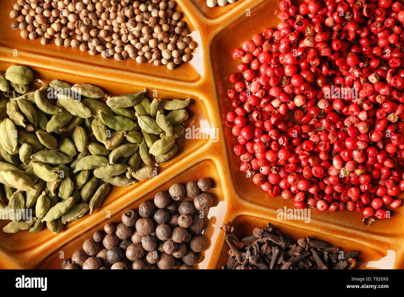Different aromatic spices on tray, closeup Stock Photo - Alamy