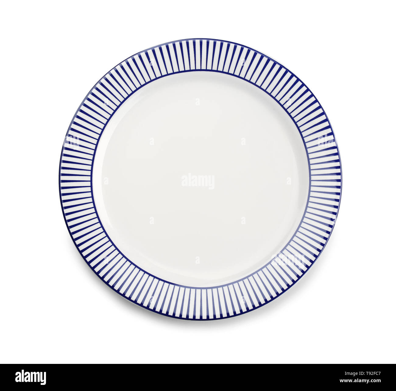 Clean empty plate on white background Stock Photo - Alamy
