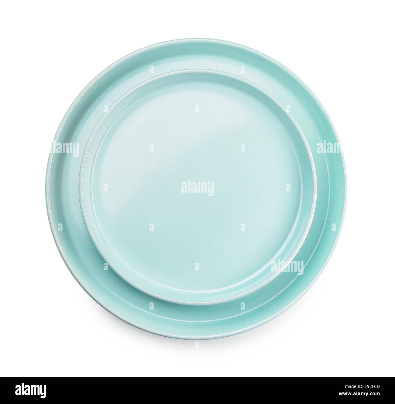 Clean color plates on white background Stock Photo - Alamy