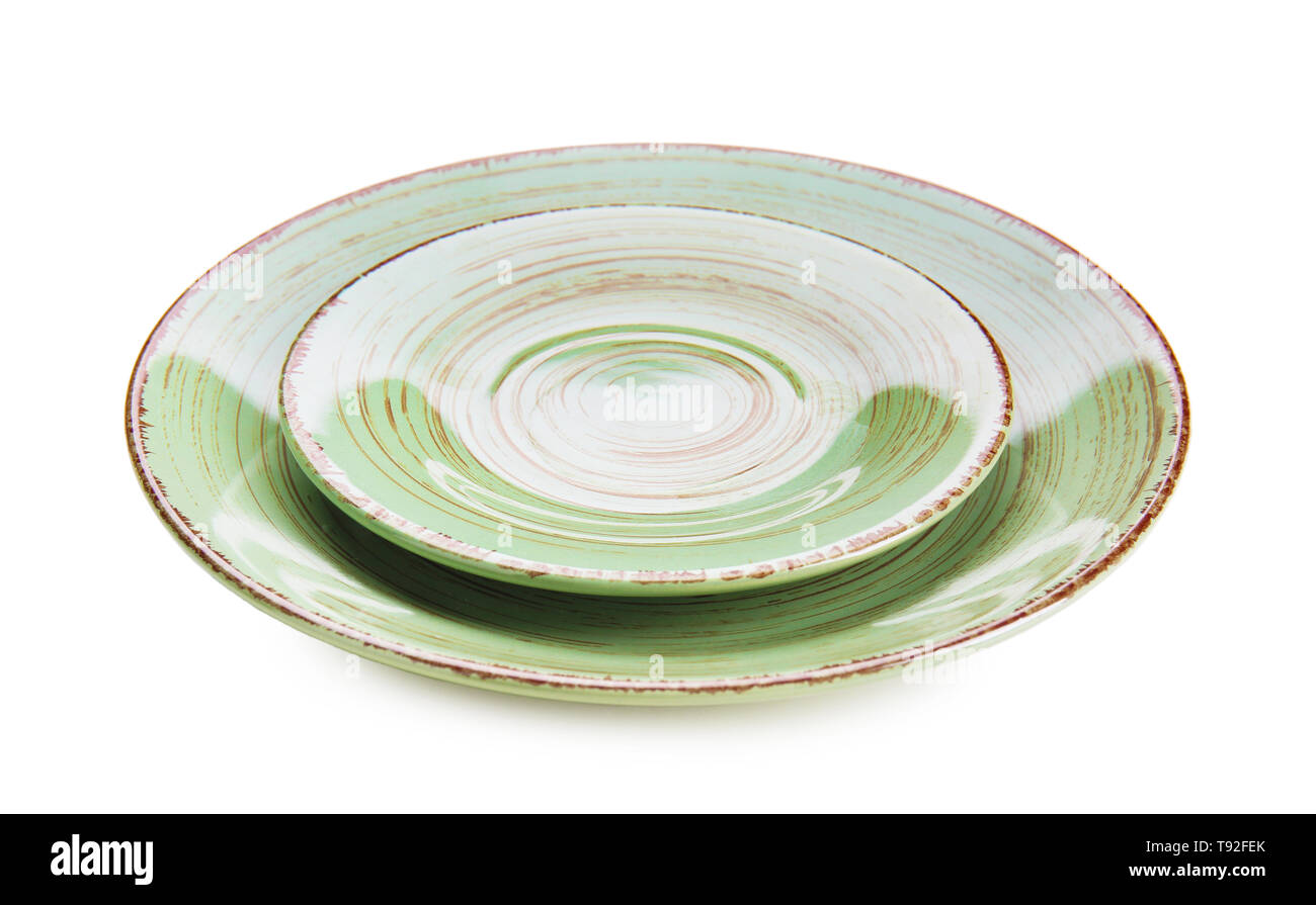 Clean color plates on white background Stock Photo - Alamy