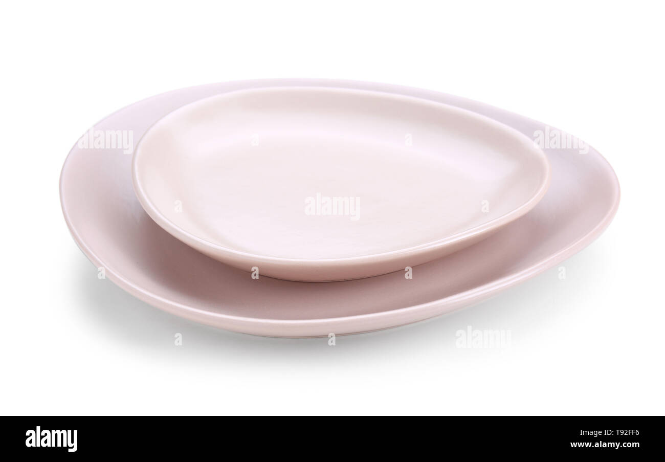 Clean color plates on white background Stock Photo - Alamy