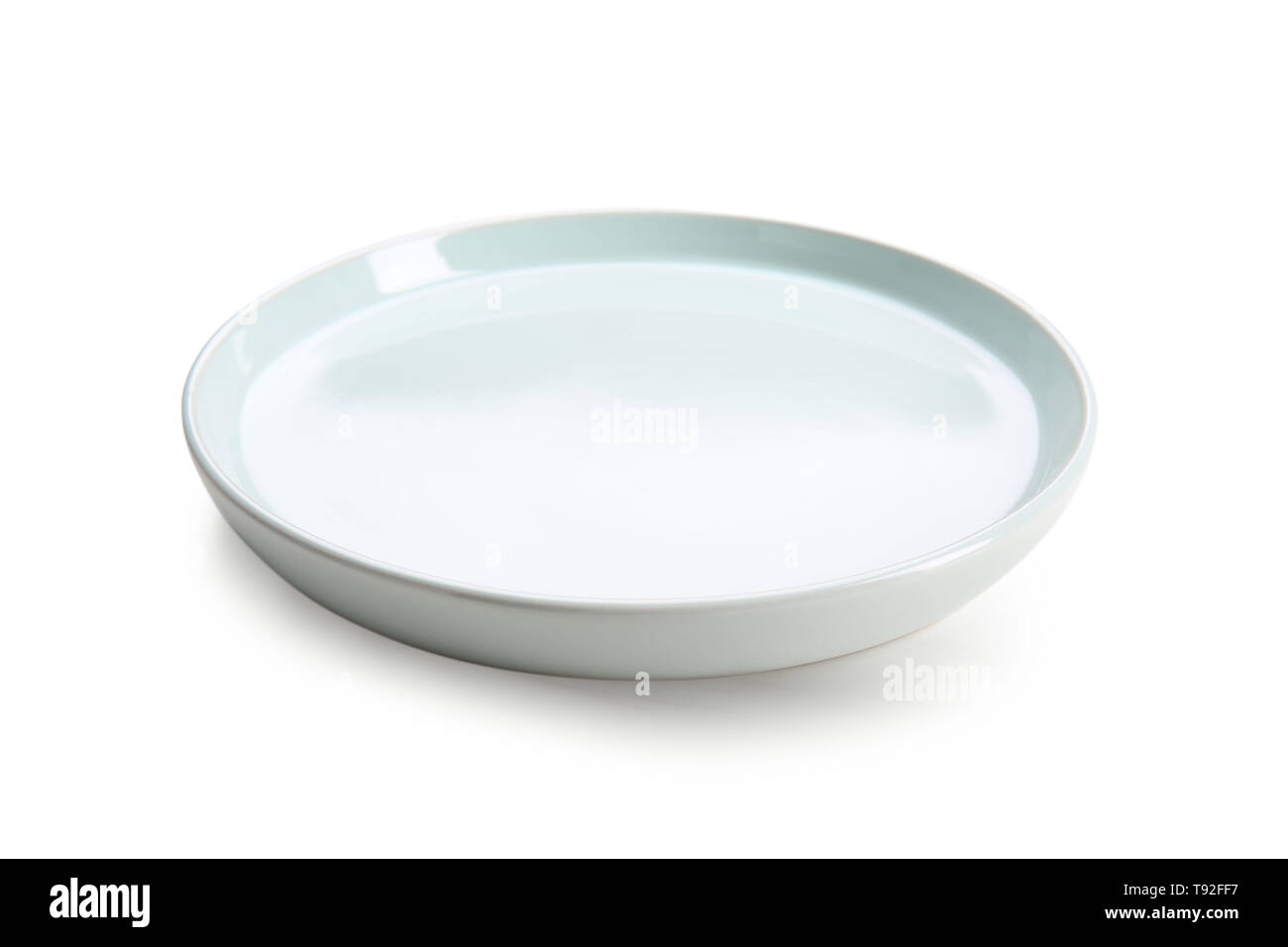 Clean empty plate on white background Stock Photo - Alamy