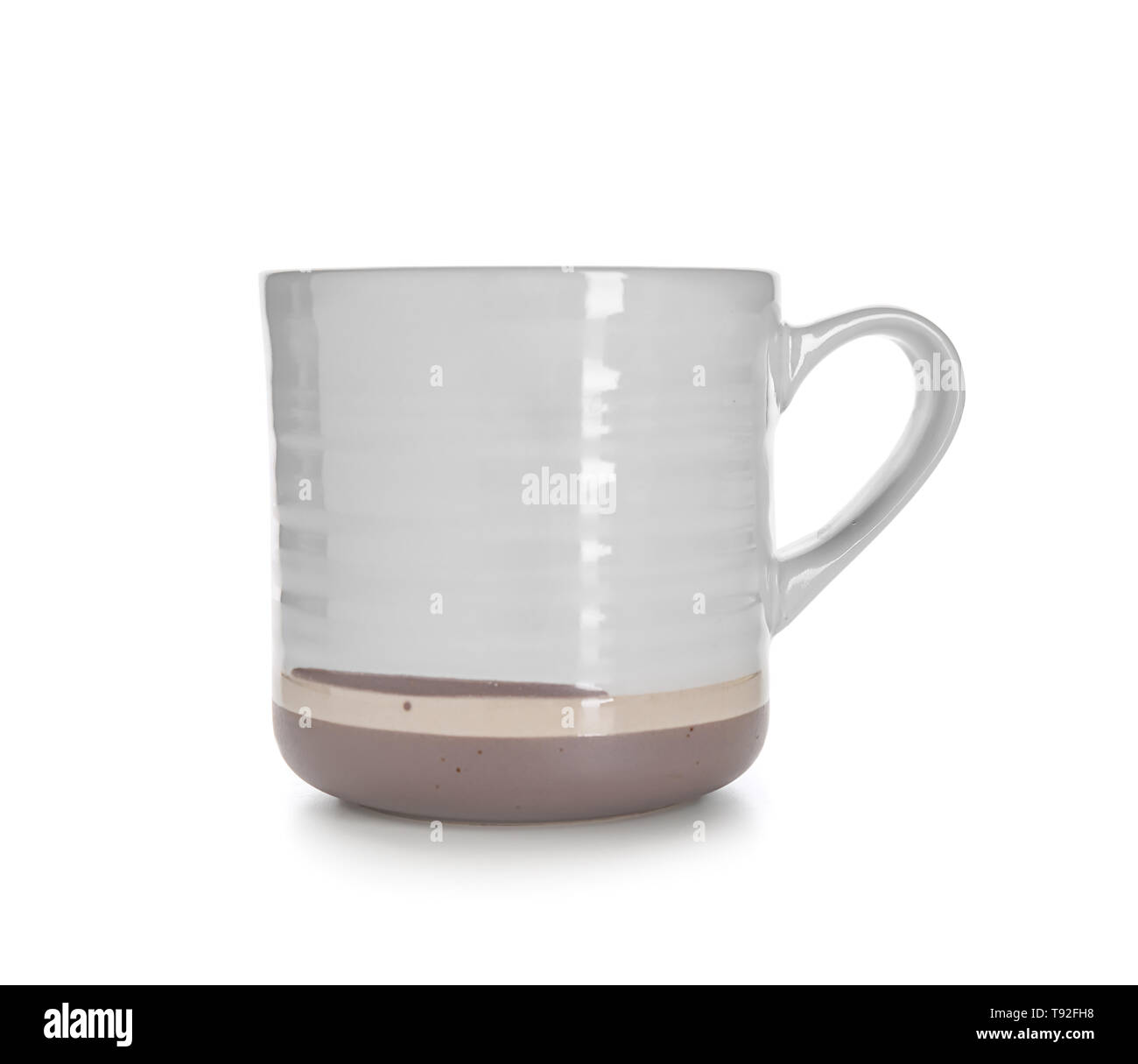 Clean empty mug on white background Stock Photo - Alamy
