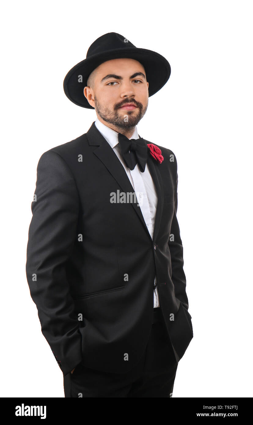 Male magician on white background Stock Photo - Alamy
