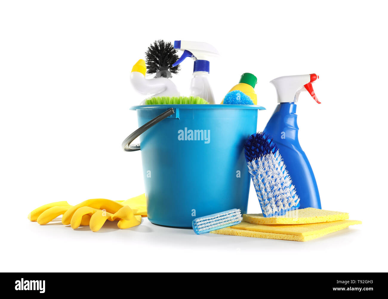 Bucket with cleaning supplies on white background Stock Photo - Alamy