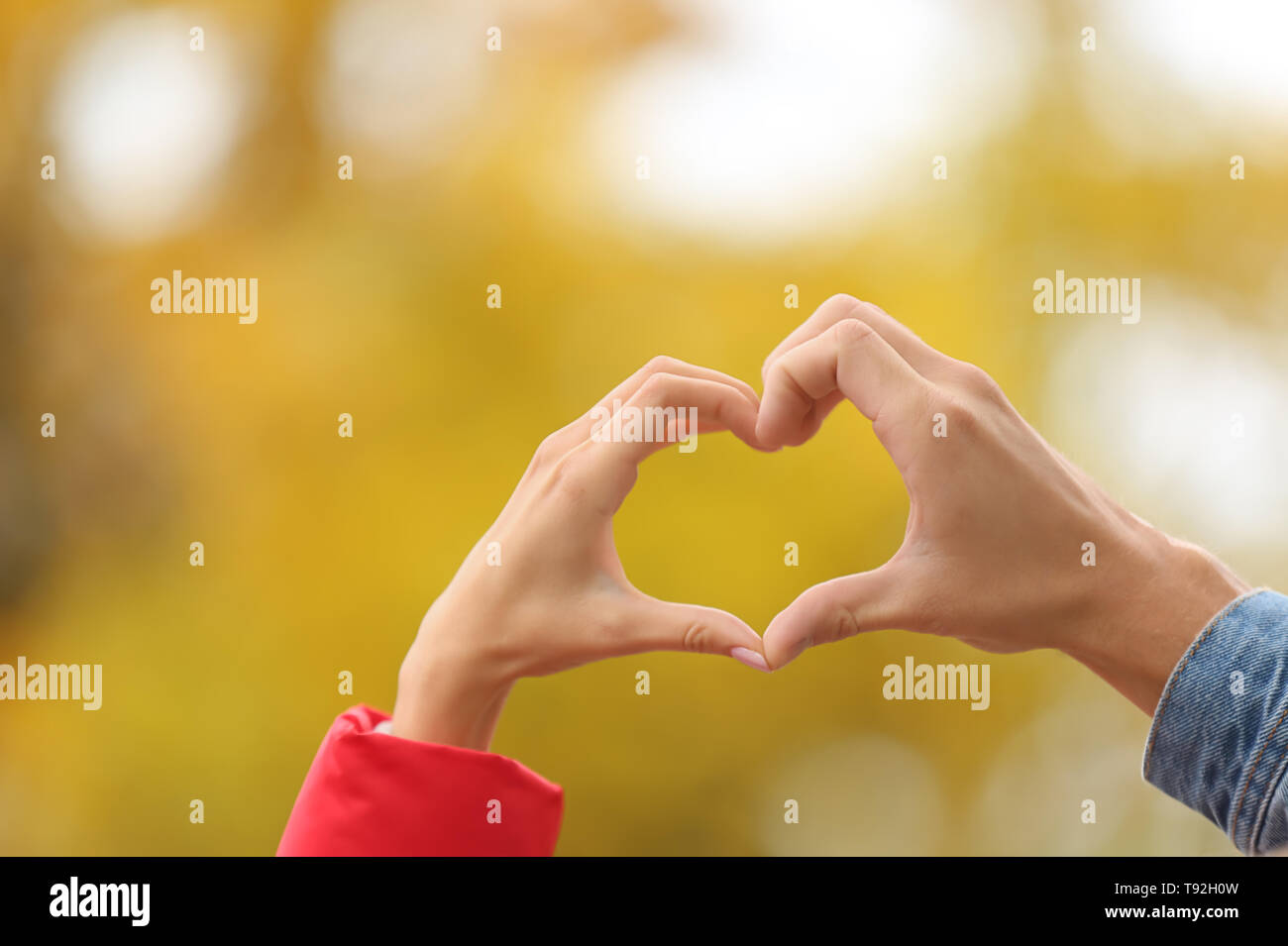 Closeup loving couple making heart hi-res stock photography and images ...