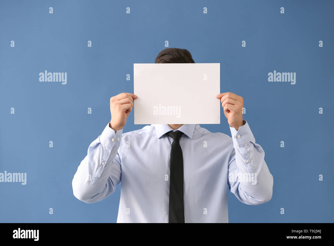 Businessman covering face paper hi-res stock photography and images - Alamy