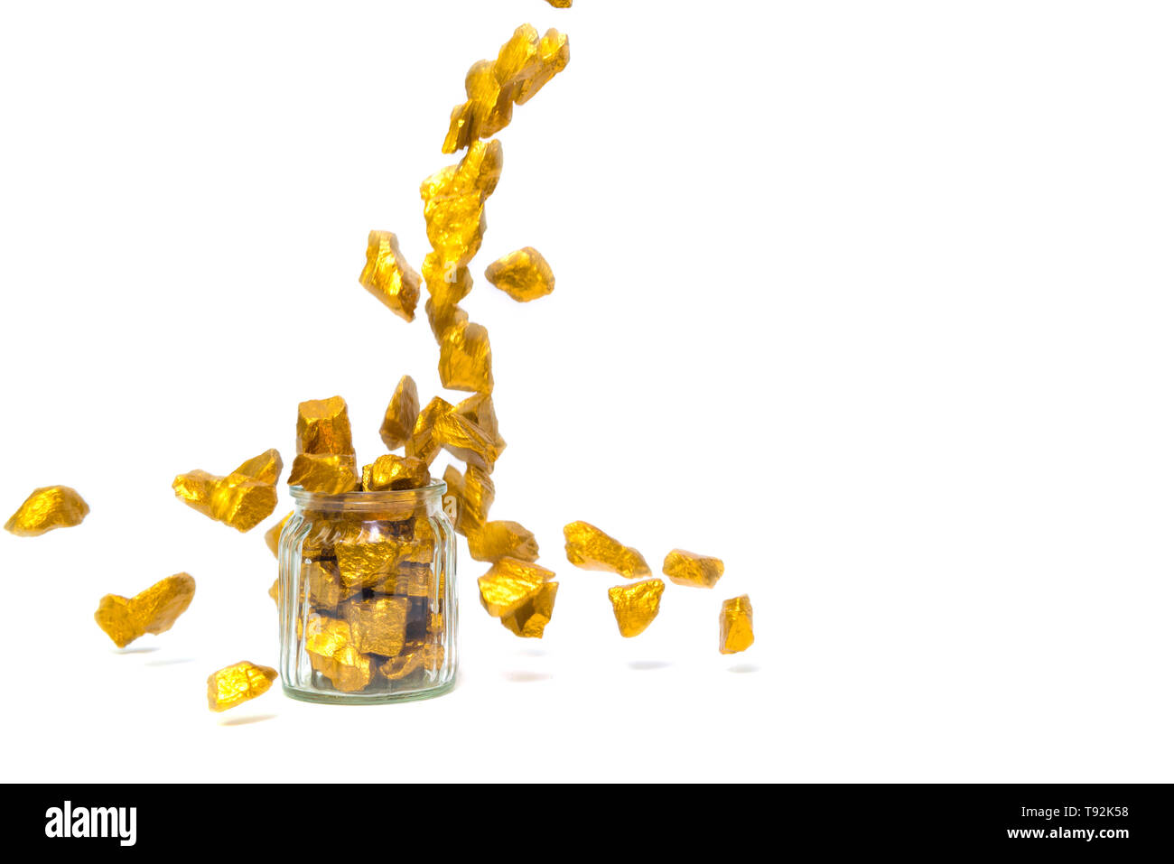 Falling gold nuggets, gold ore , precious stone or lump of golden stone ...