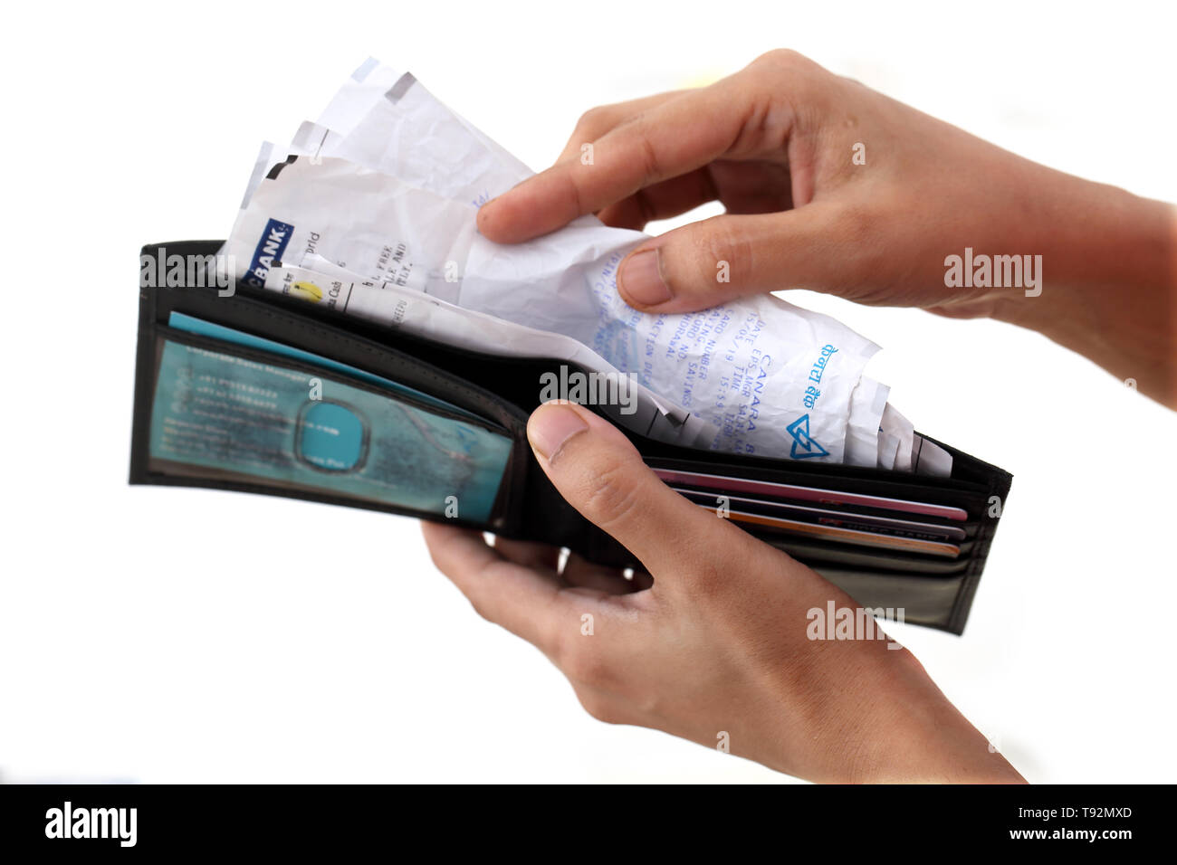Overstuffed wallet with credit cards hi-res stock photography and ...