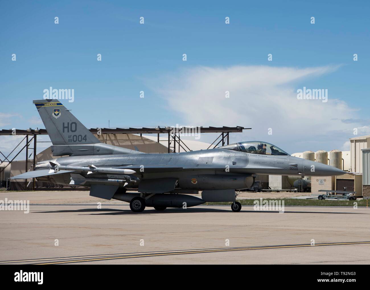 A 311th F-16 Fighting Falcon pilot displays the squadron “Fangs Out ...