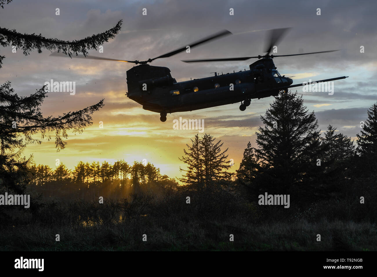 A U.S. Army MH-47 Chinook helicopter approaches a landing zone during ...