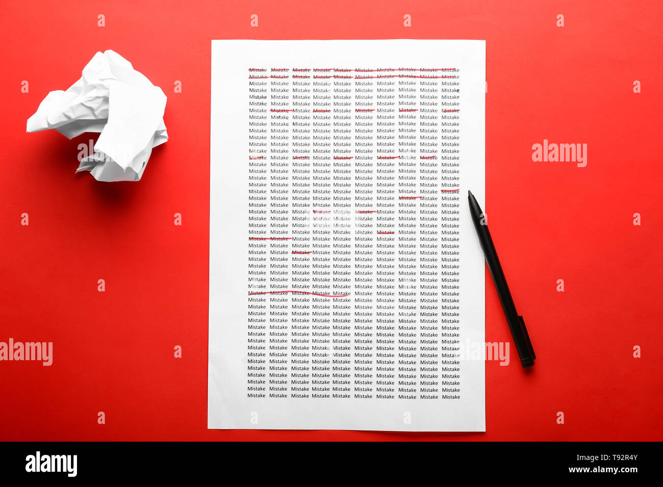 Sheet of paper with printed words MISTAKE on color background, top view ...