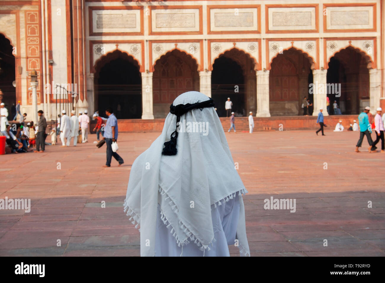 young muslim man with turban and head scarf at the Jama Masjid Stock ...