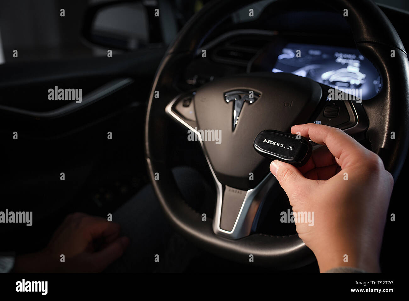 Inside view of Tesla Electric Vehicle. Sreering Wheel and Displays ...