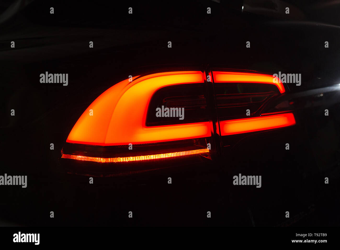 Bright Orange Rear Light of Beautiful Tesla Model X Stock Photo - Alamy