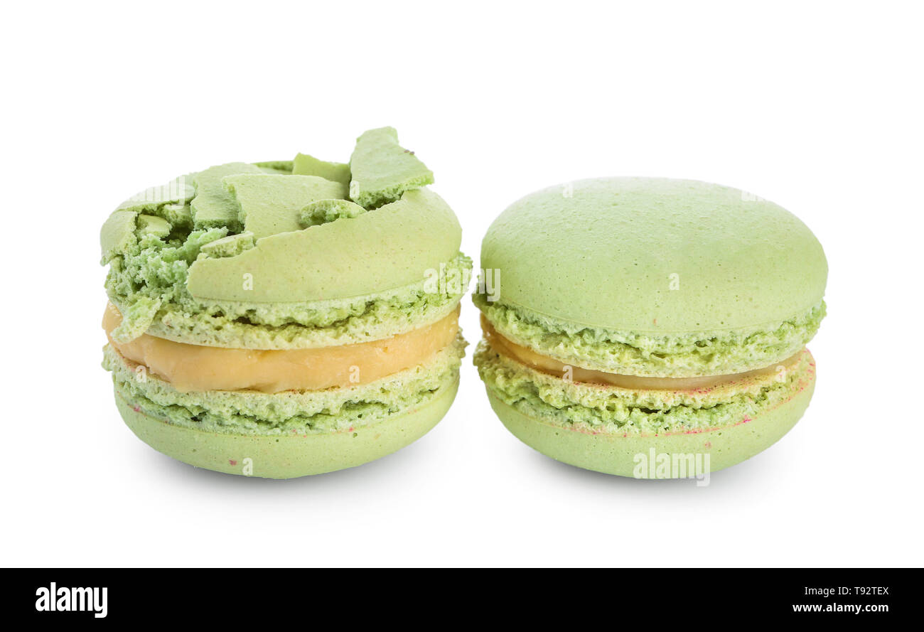 Crushed and whole macaroon on white background Stock Photo - Alamy