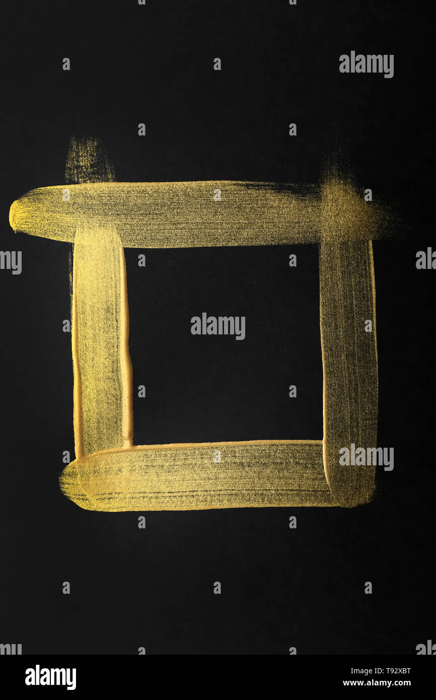 Painted golden frame on dark background Stock Photo - Alamy