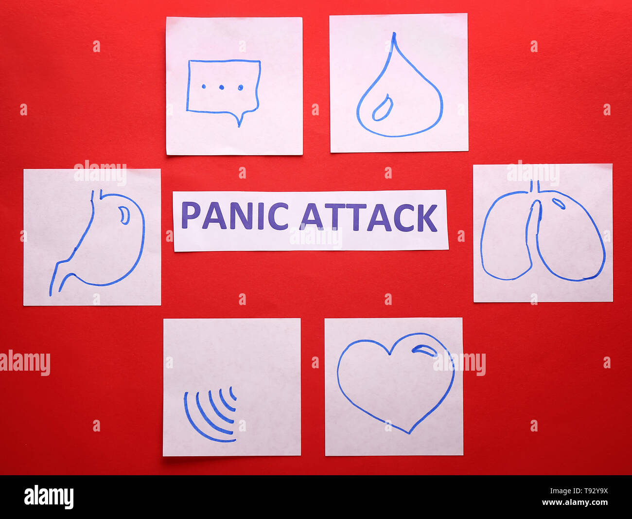 Paper cards with different drawings and text PANIC ATTACK on color ...