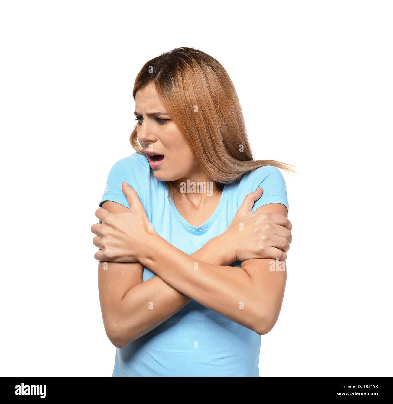 Woman having panic attack on white background Stock Photo - Alamy