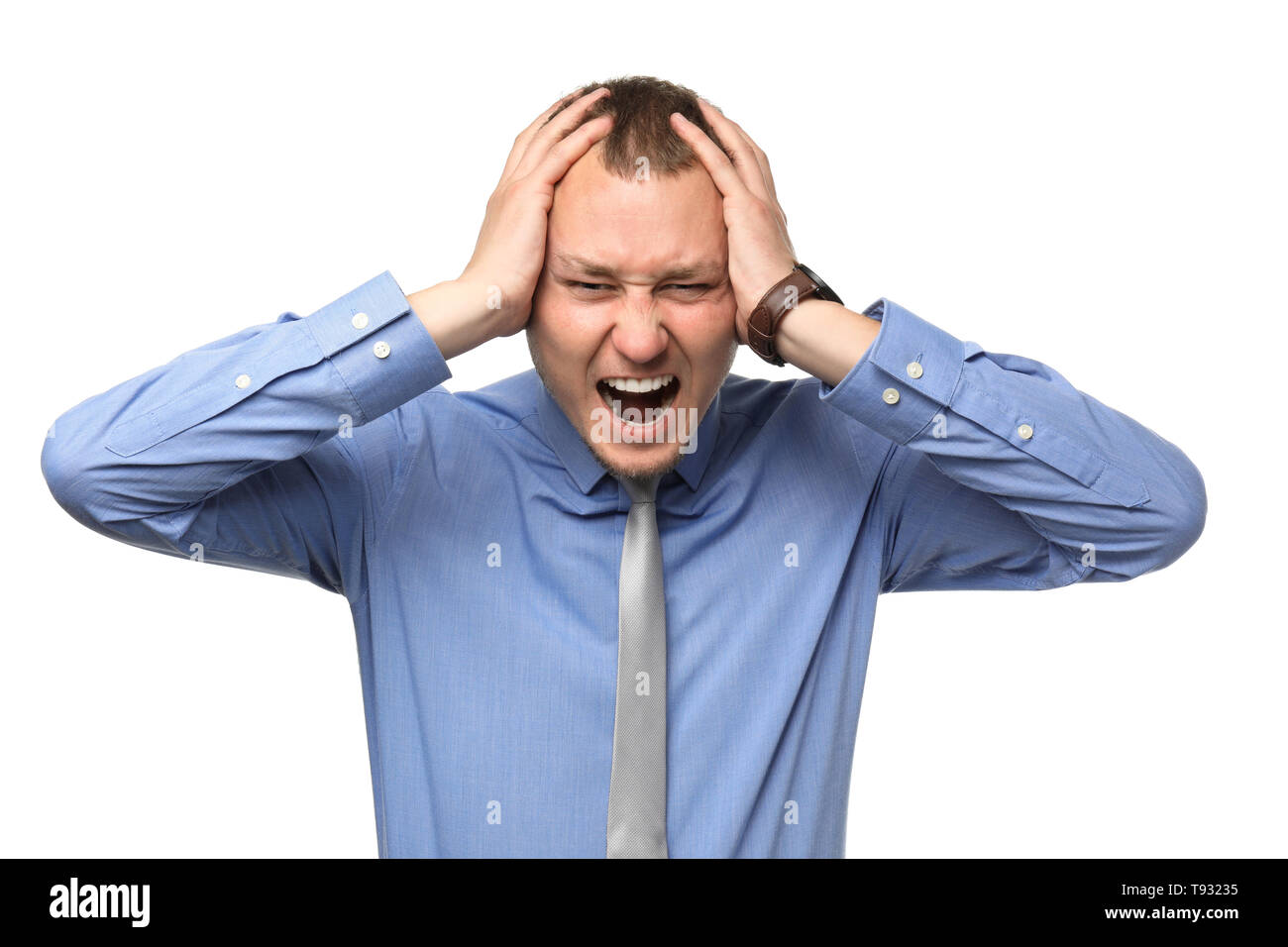 Businessman having panic attack on white background Stock Photo - Alamy