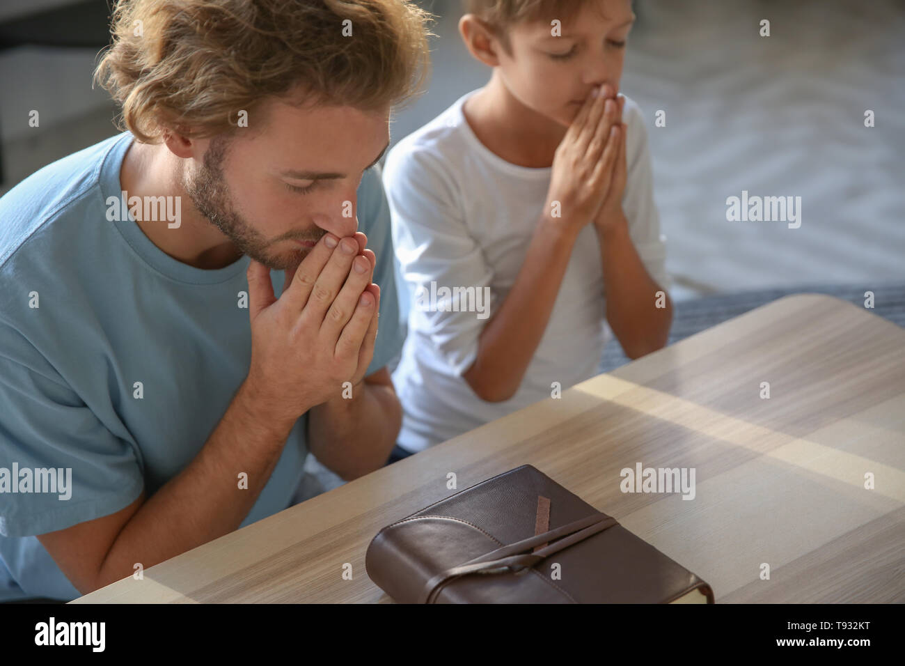 Parent kid bible hi-res stock photography and images - Alamy