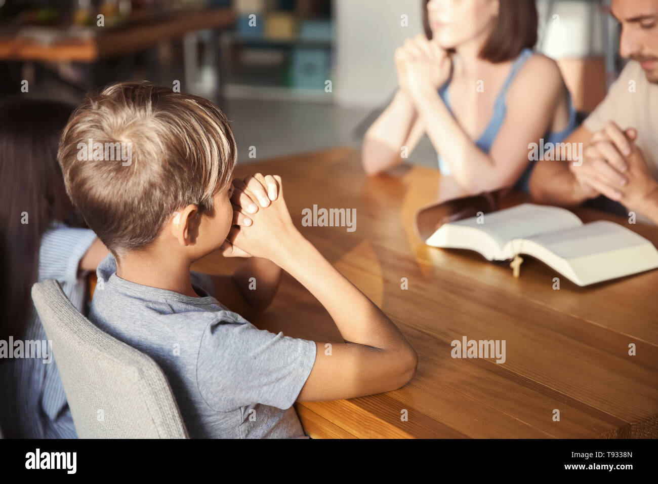 Family praying at home Stock Photo - Alamy