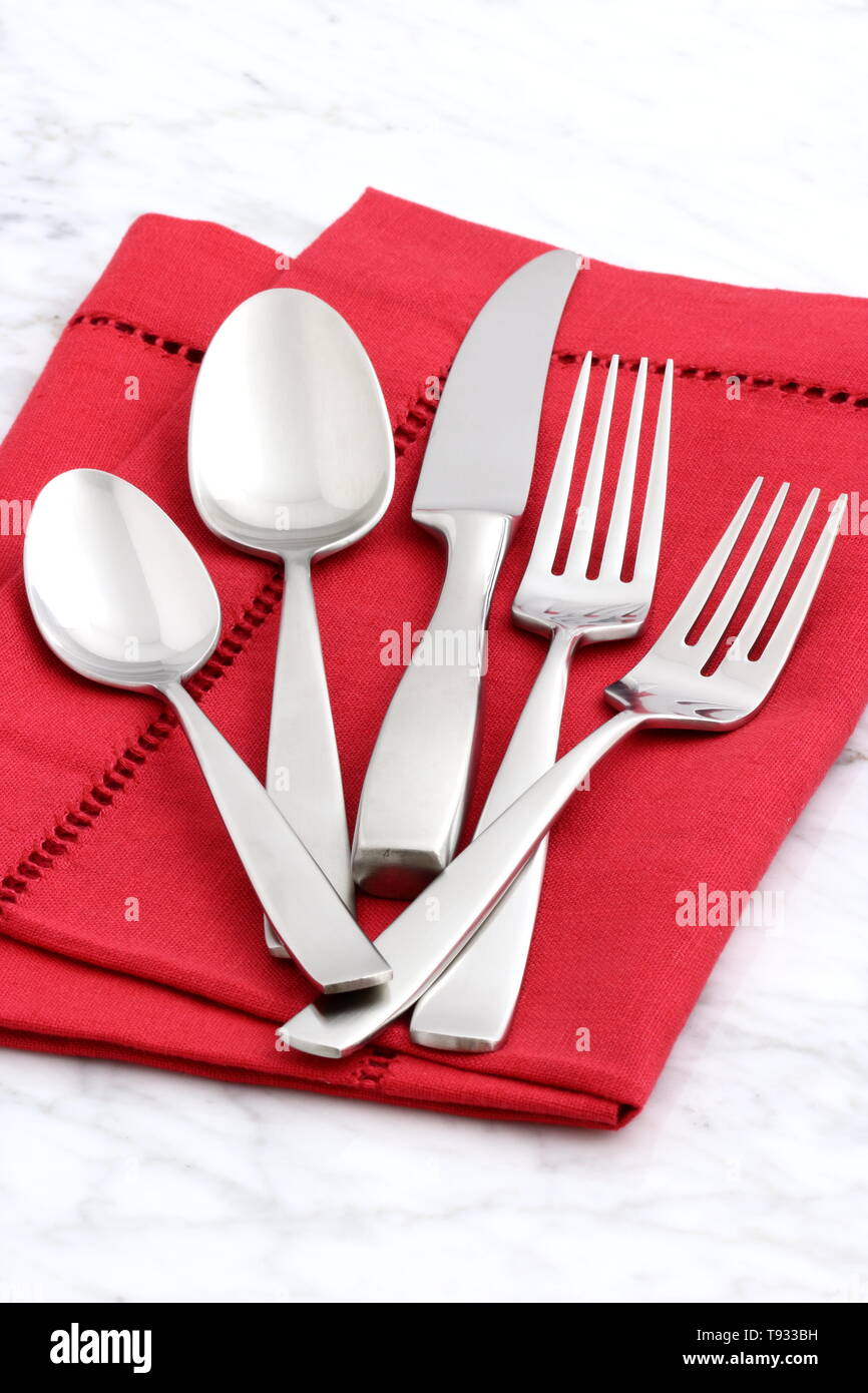 trendy and beautiful silverware set styled on linen double hemstitch ...