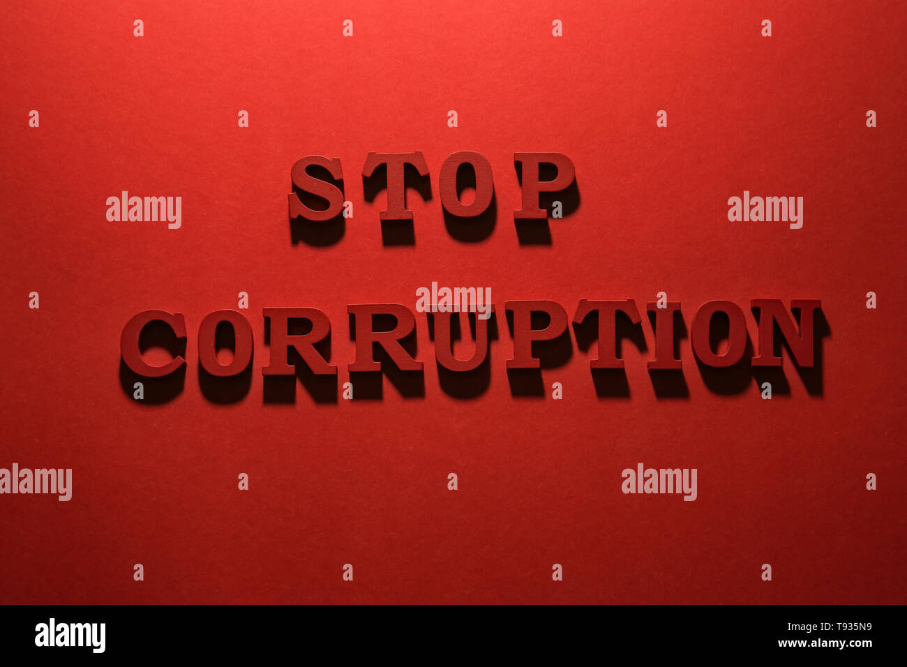 Text STOP CORRUPTION on red background Stock Photo - Alamy