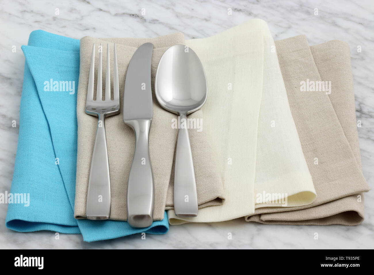 trendy and beautiful silverware set styled on linen double hemstitch ...