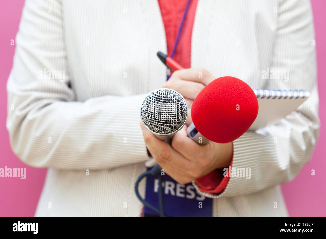 News reporter asking comment writing hi-res stock photography and ...
