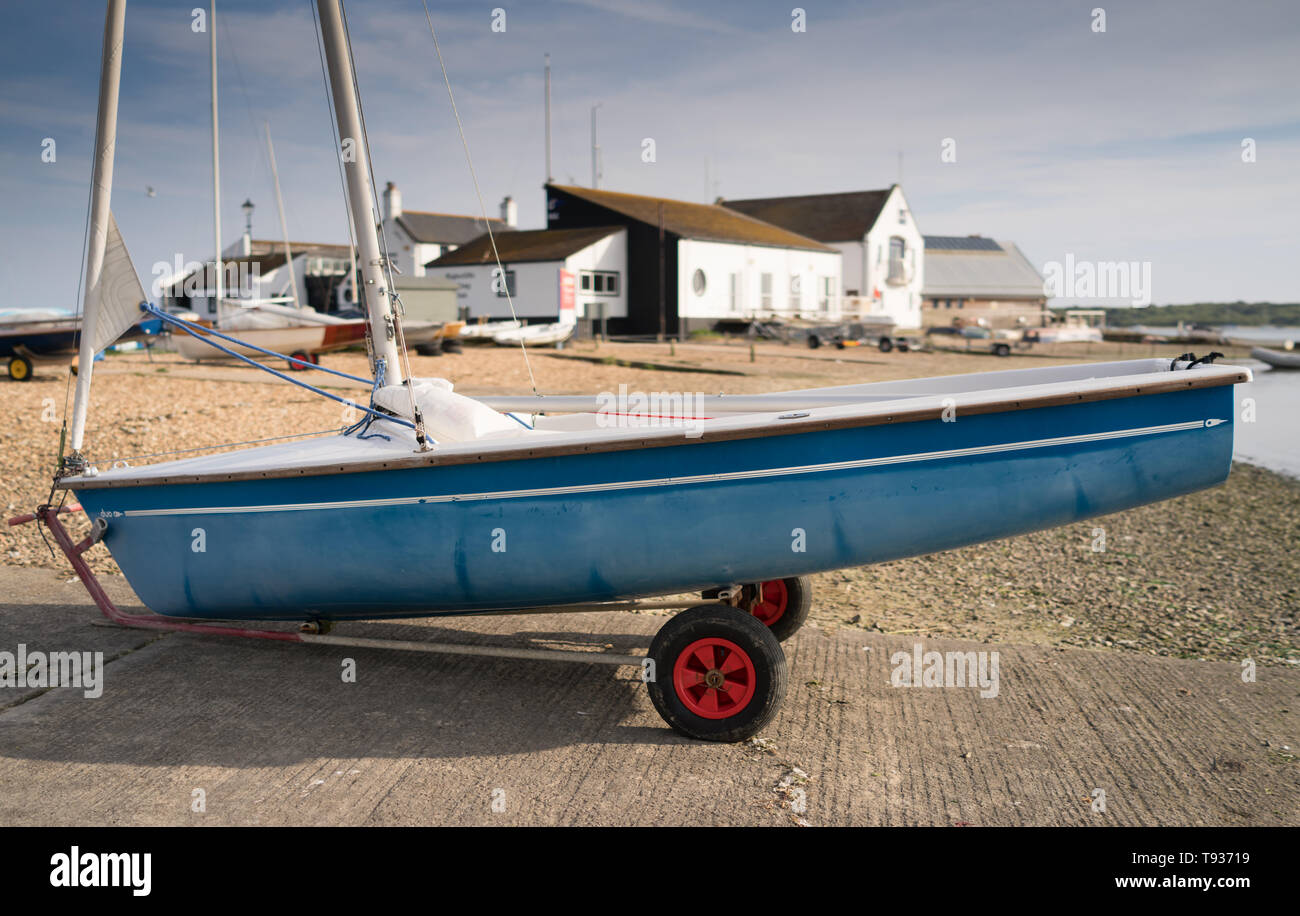Sailing boat at Mudeford quay with The Haven pub and RNLI in background ...