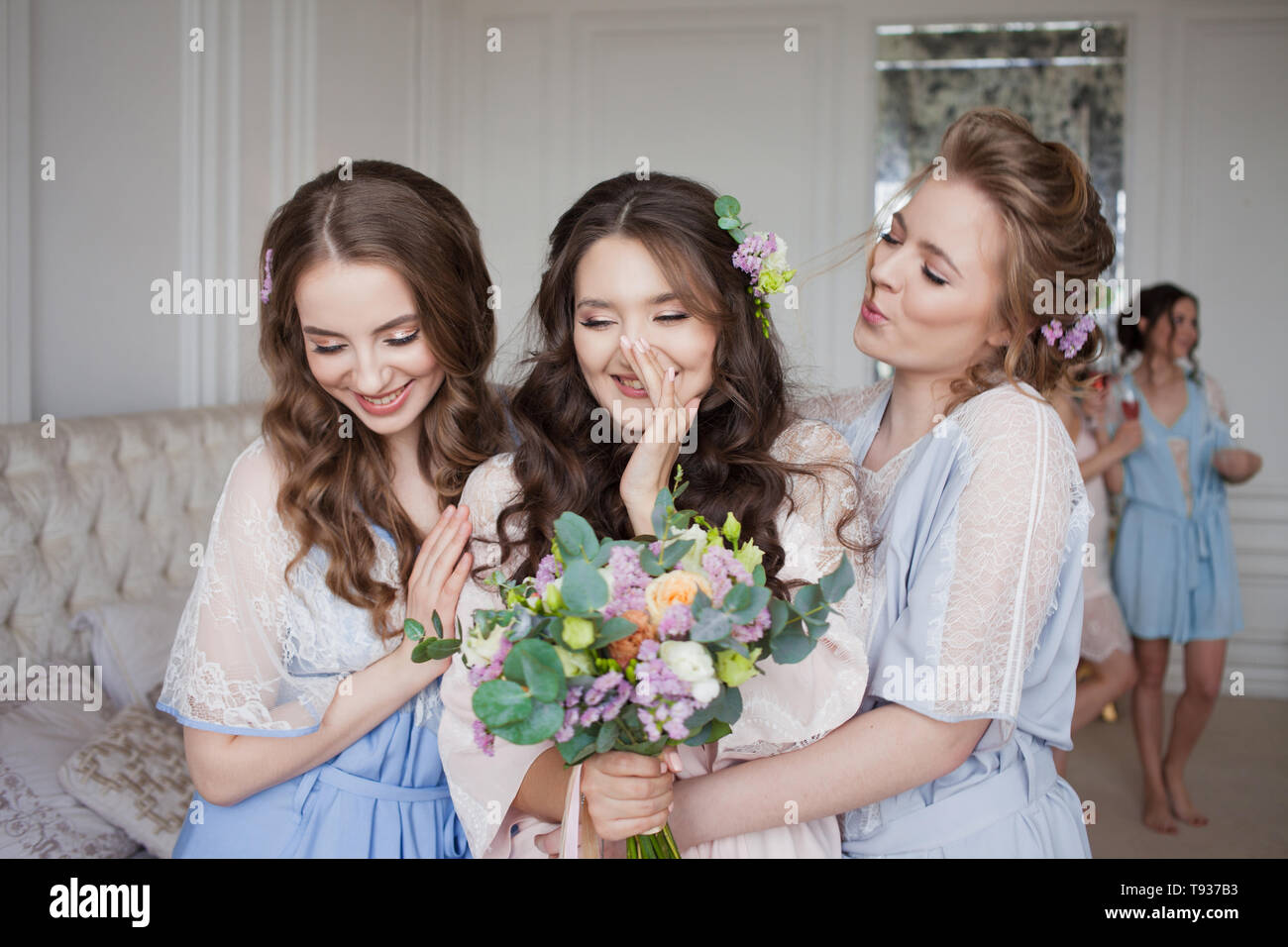 Girlfriends hug bride, bachelorette party. Beautiful young women in ...