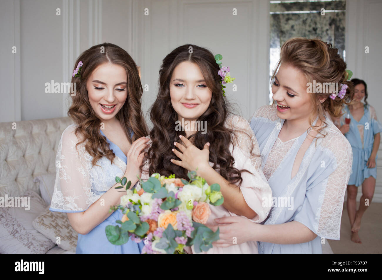 Girlfriends hug bride, bachelorette party. Beautiful young women in ...