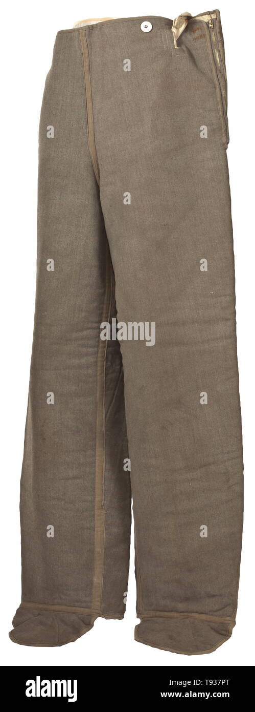 A pair of reversible winter trousers of the Waffen-SS early depot piece ...