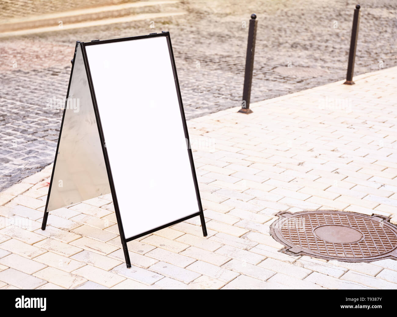 Blank advertising board on city street Stock Photo - Alamy