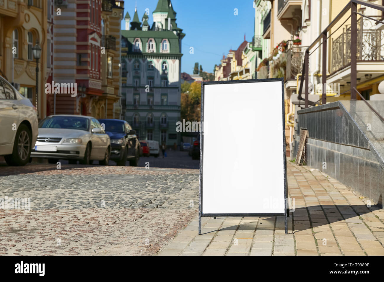 Blank advertising board on city street Stock Photo - Alamy