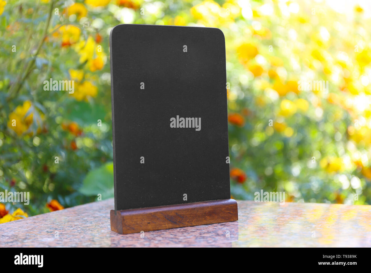 Blank menu board on table of cafe outdoors Stock Photo - Alamy